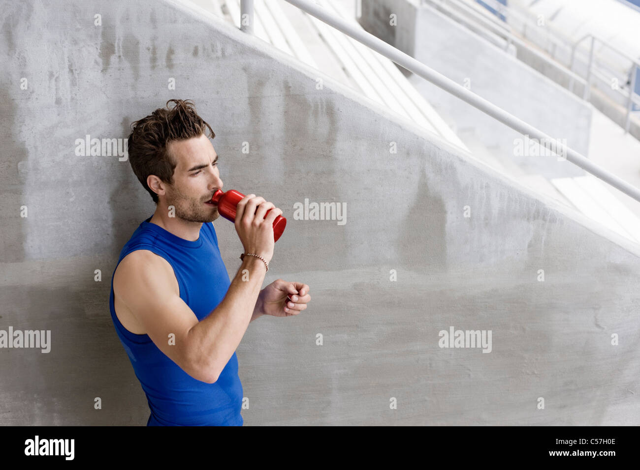 Runner drinking water Stock Photo - Alamy