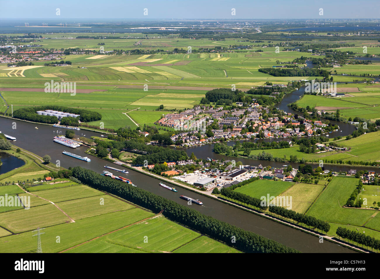 The Netherlands, Nigtevecht, Cargo ships on canal called Amsterdam Rijn ...