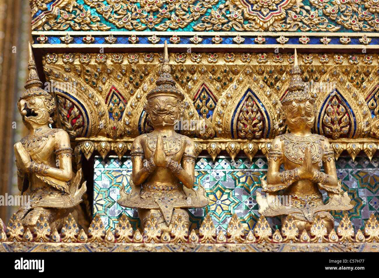 golden statue in temple Stock Photo - Alamy