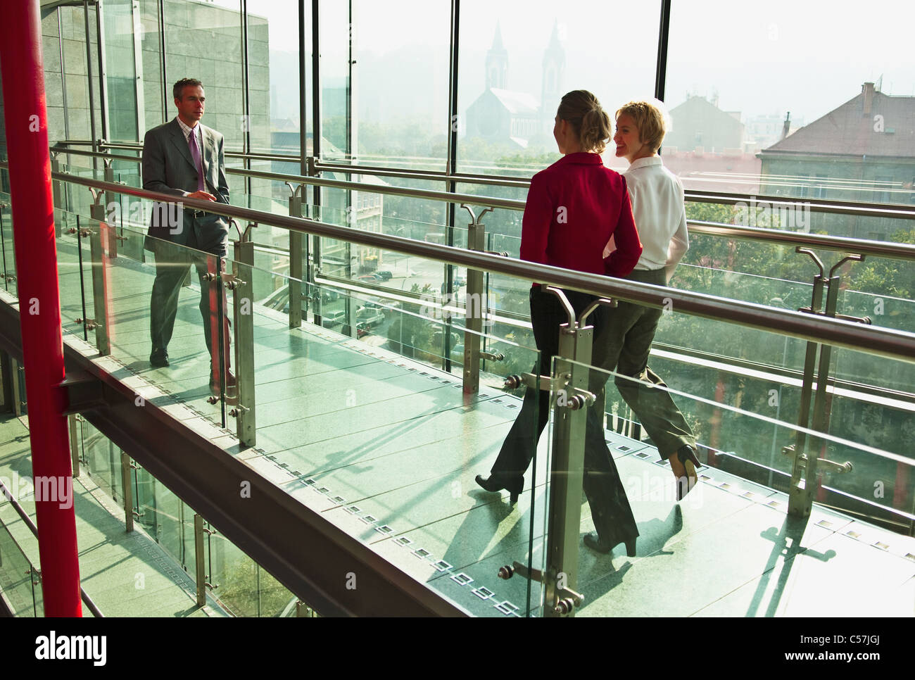 Business people walking on walkway Stock Photo - Alamy