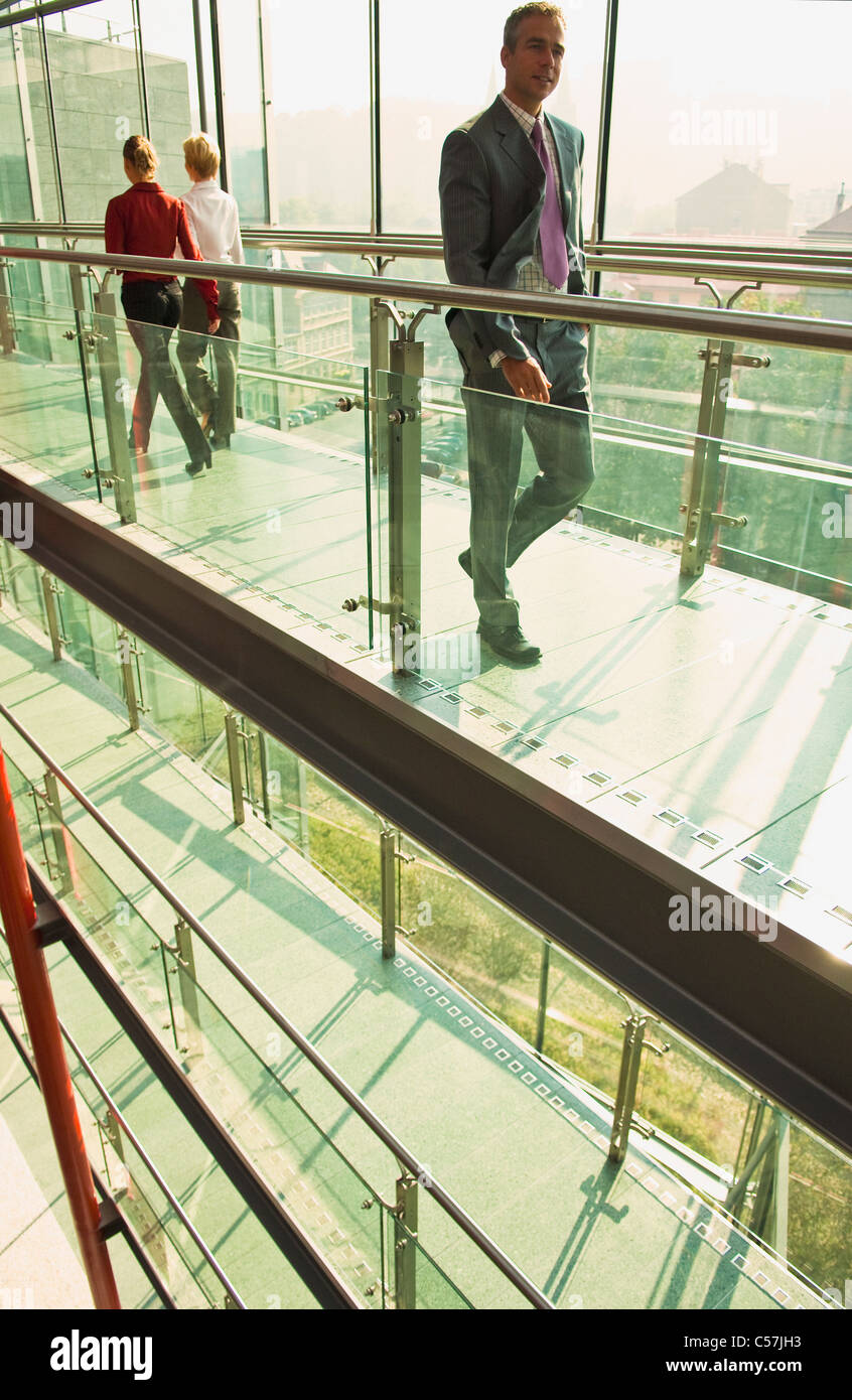 Man walking walkway wall day hi-res stock photography and images - Alamy