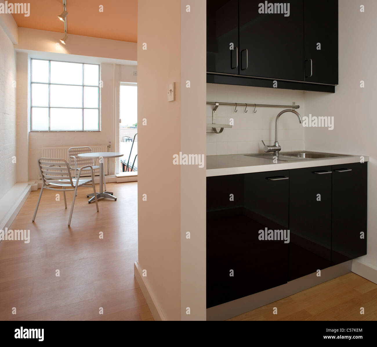 Renovated small empty office units with wooden floors Stock Photo - Alamy