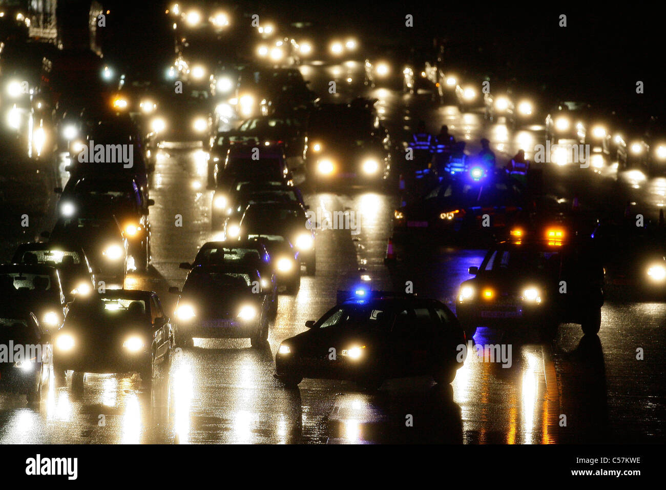 Traffic chaos after heavy rain floods a motorway. Picture by James ...
