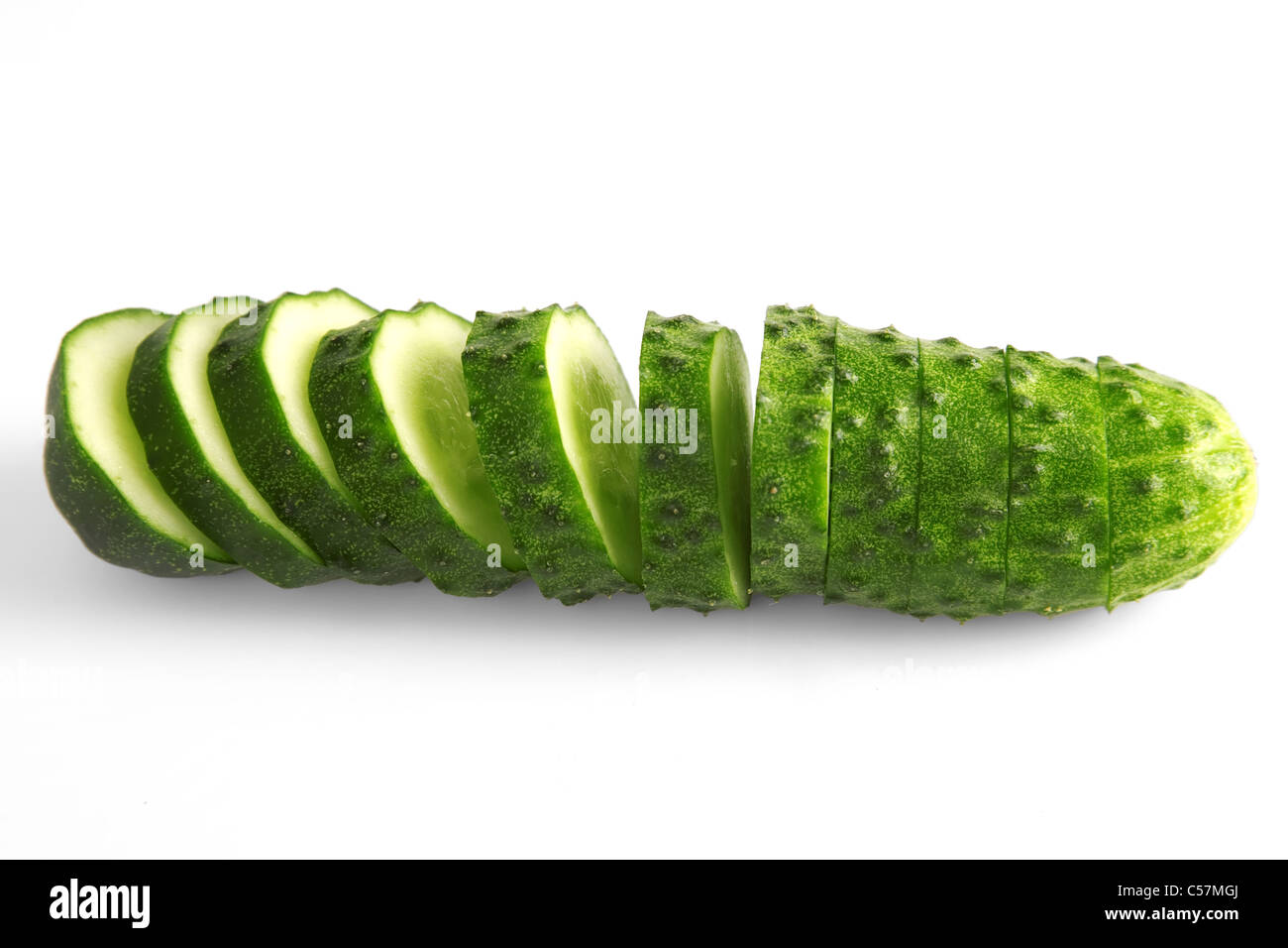front view of cucumber slices isolated on white Stock Photo - Alamy