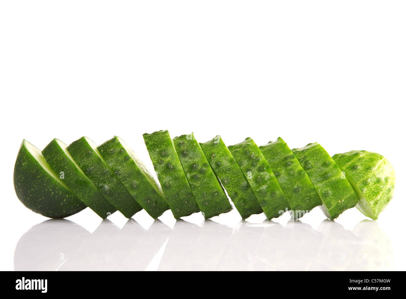 front view of cucumber slices isolated on white Stock Photo - Alamy