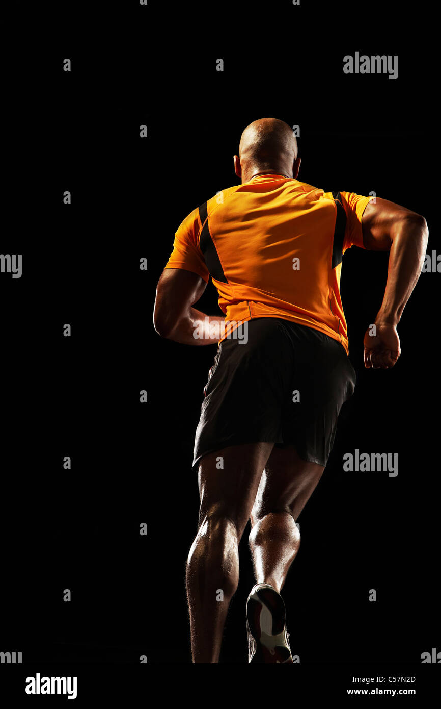 Rear shot runner young man hi-res stock photography and images - Alamy