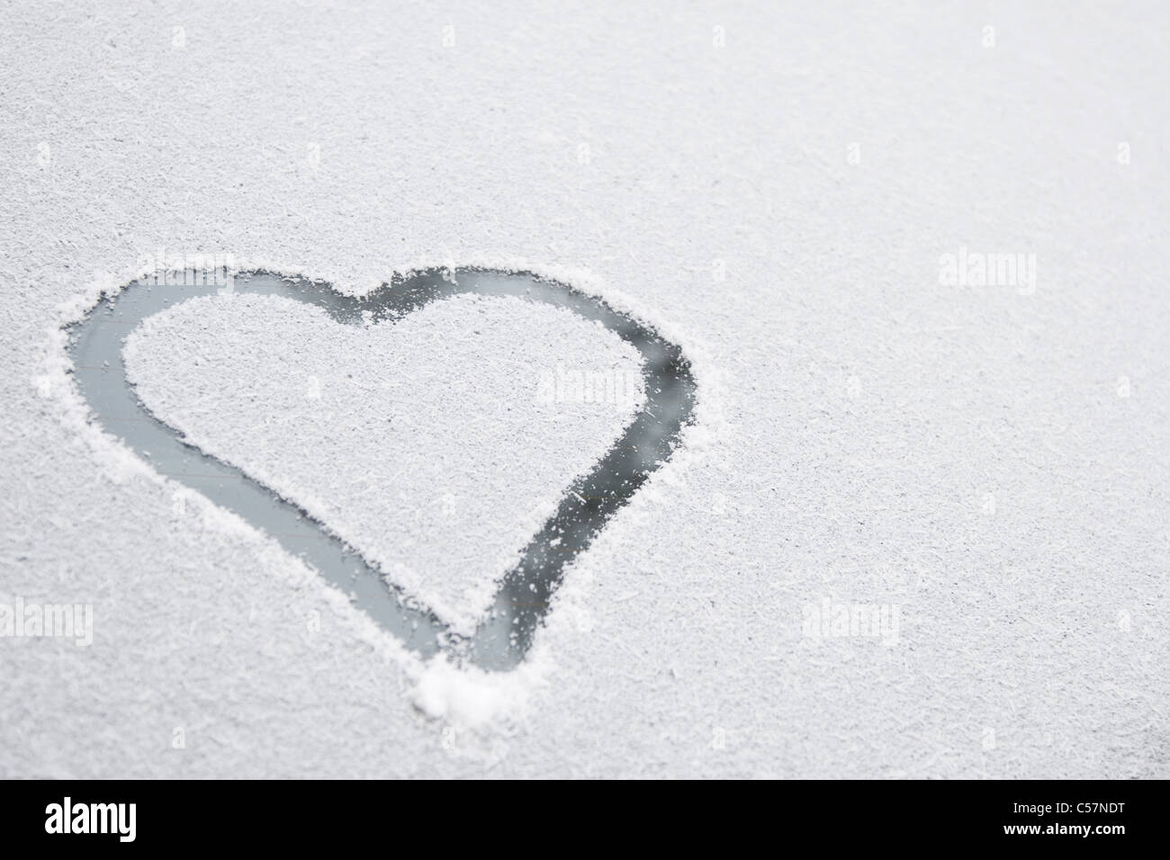Heart shape drawn on white snow, love symbol for Valentine Day Stock ...