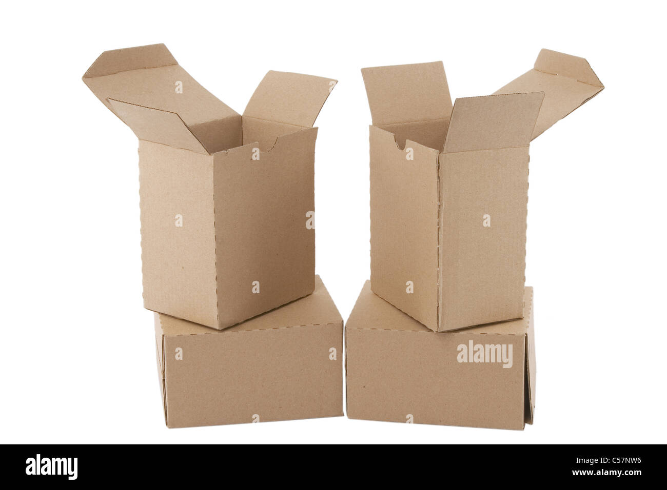 Brown cardboard boxes arranged in stack on white background Stock Photo ...
