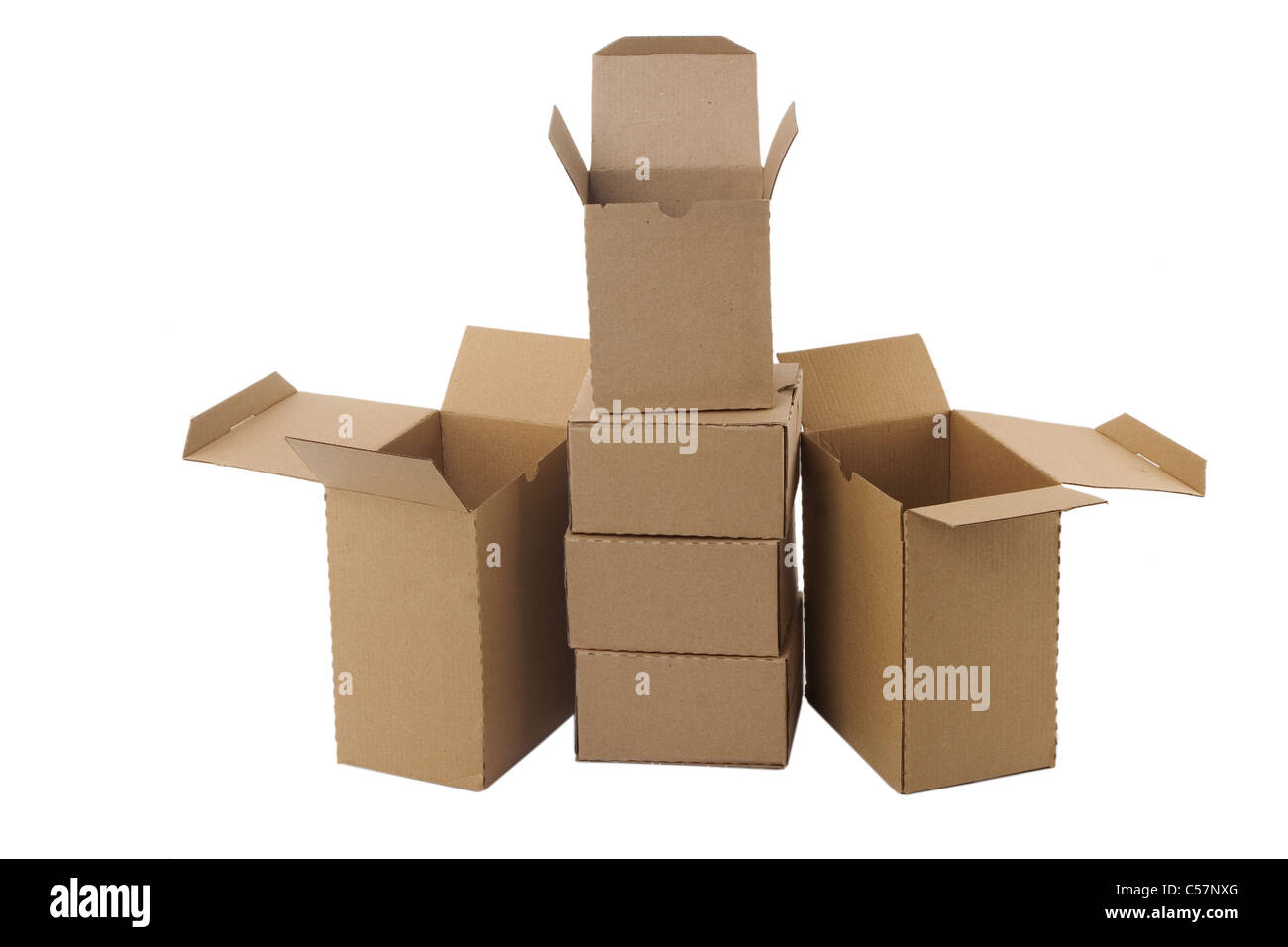 Brown cardboard boxes arranged in stack on white background Stock Photo ...