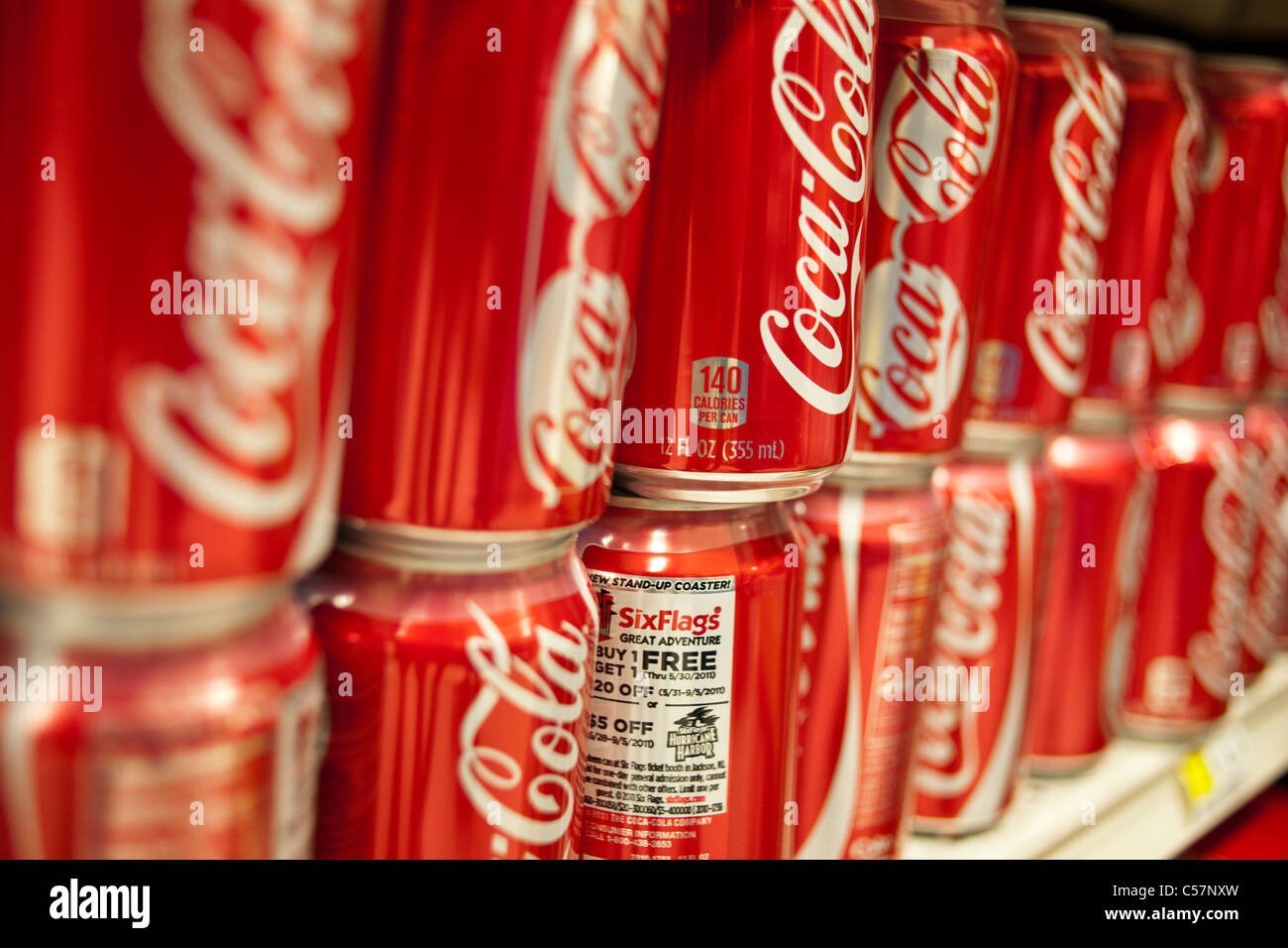 Six-packs of cans of Coca-Cola in a supermarket in New York on Thursday ...