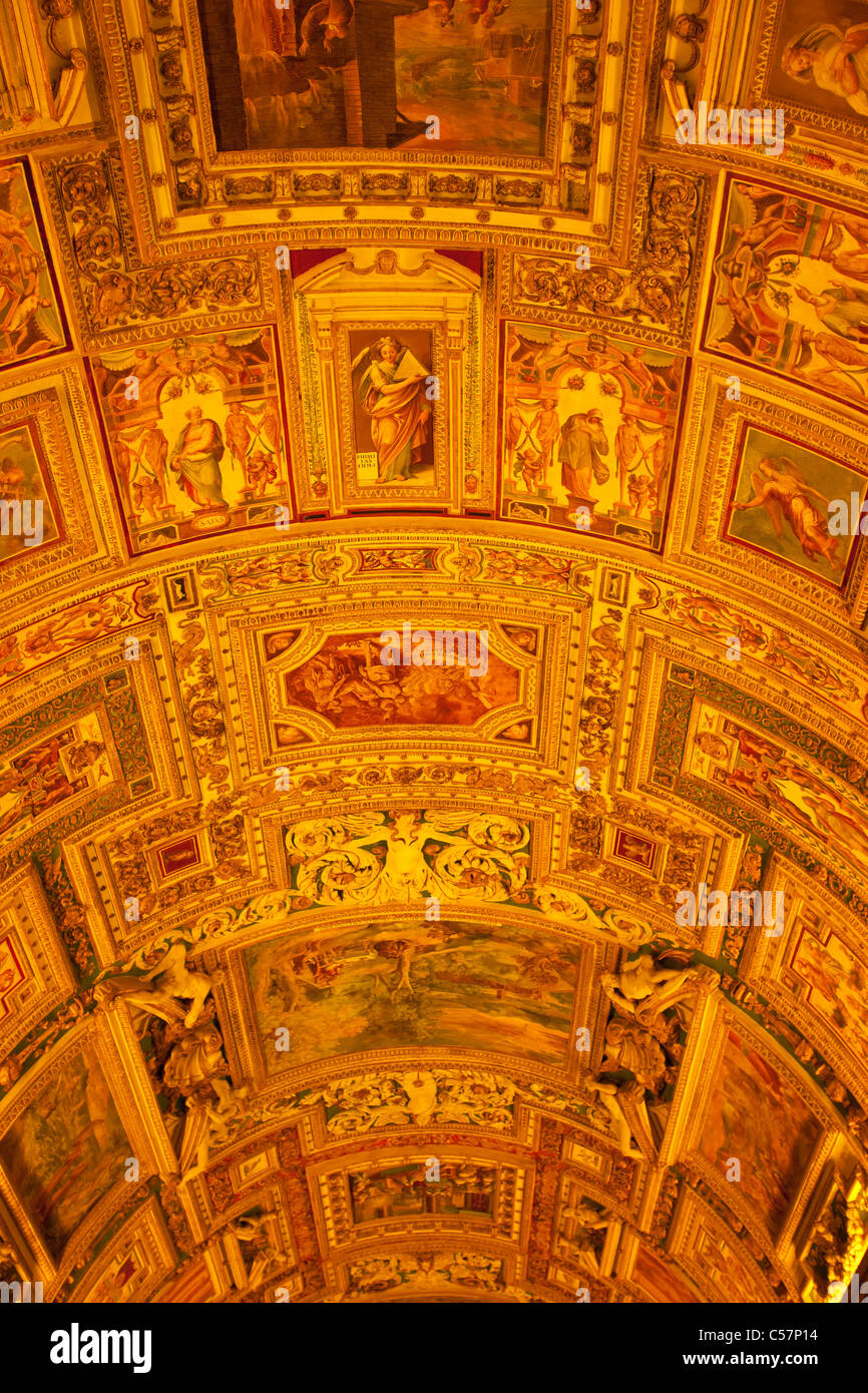 A highly ornate, beautiful fresco painted ceiling of one of the Vatican Museums in Vatican City ...