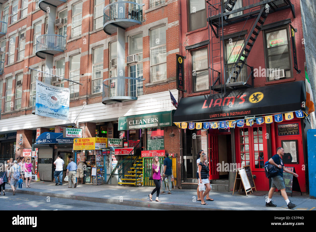 Stores and restaurants along Fulton Street in Lower Manhattan in New ...