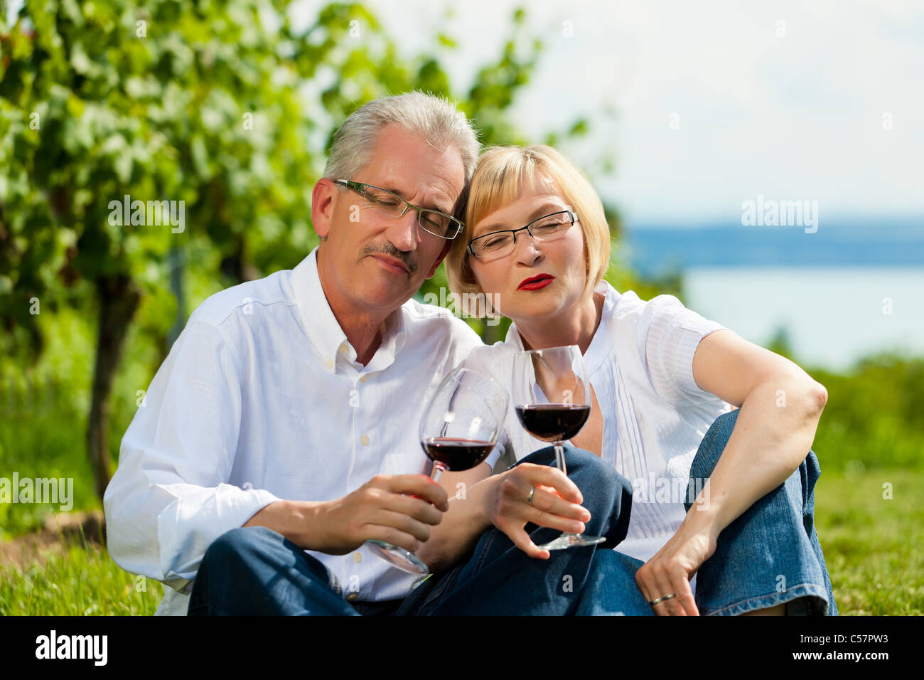 Happy mature couple - senior people (man and woman) already retired ...