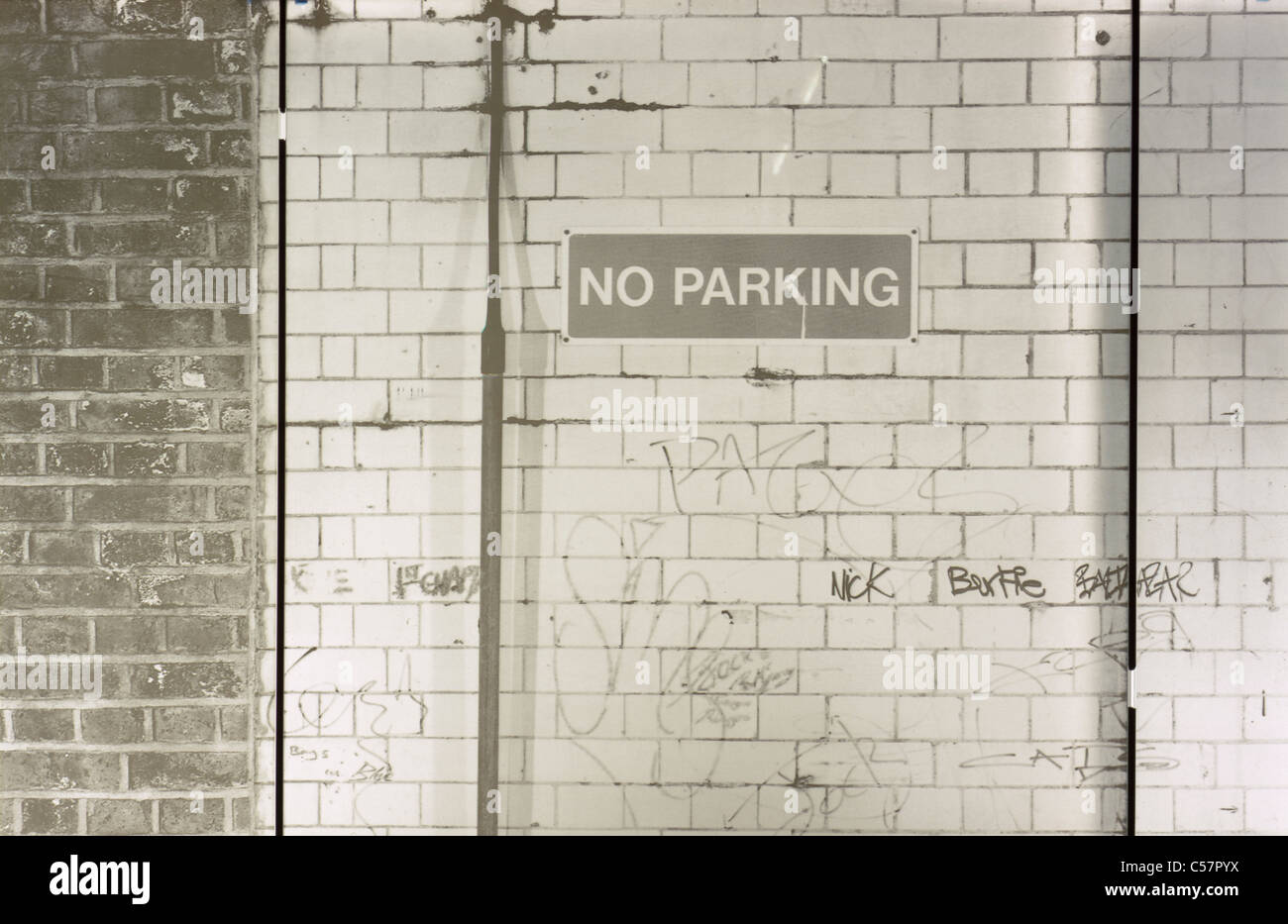 Sutton Walk, South Bank London. Wall detail with sign Stock Photo - Alamy