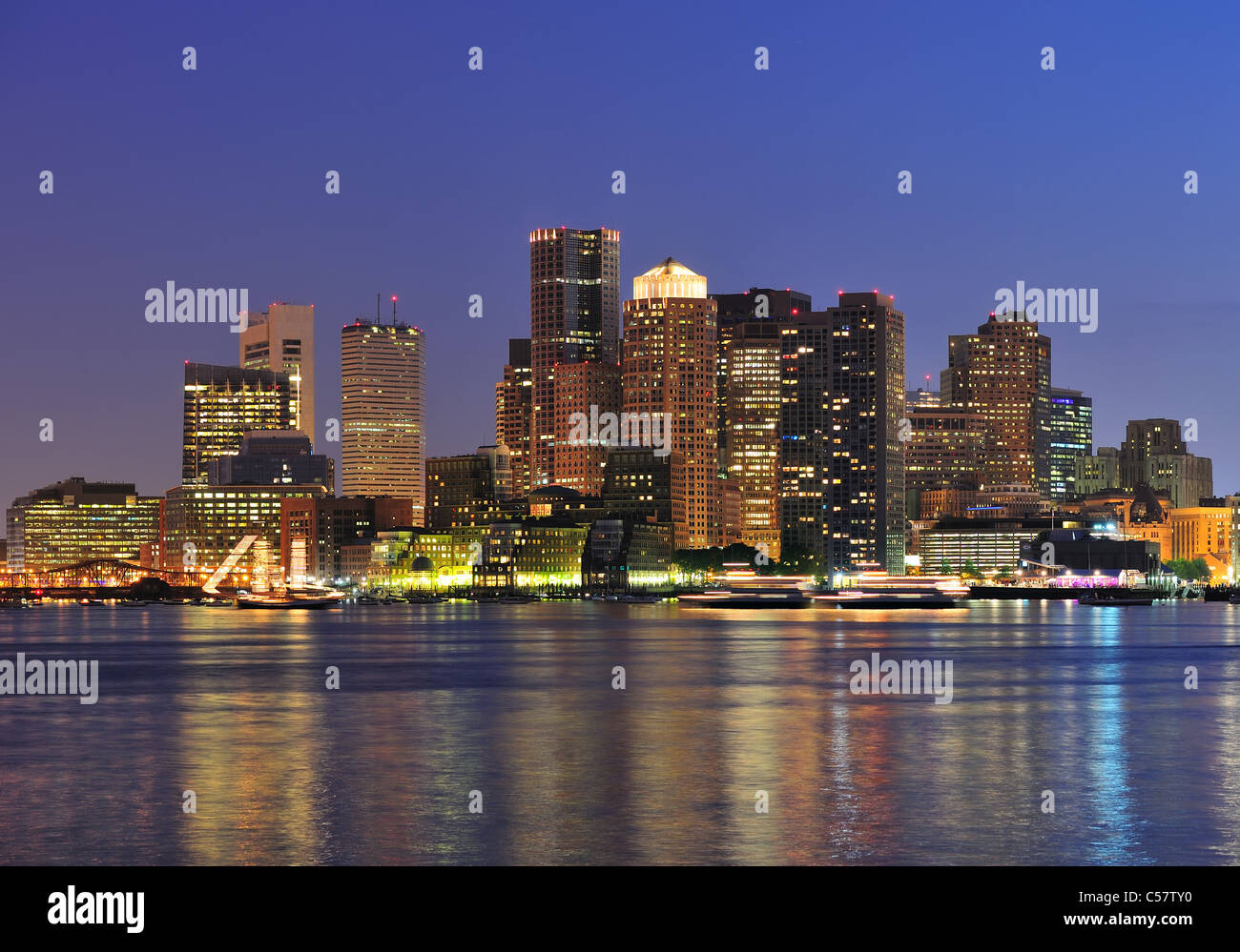 Boston downtown skyline panorama with skyscrapers over water with ...