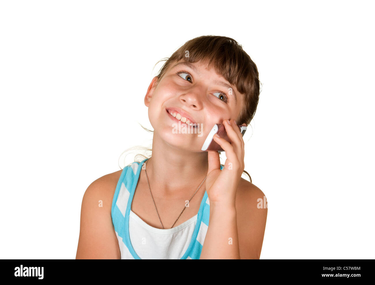 The smiling girl with a mobile phone on a white background Stock Photo ...