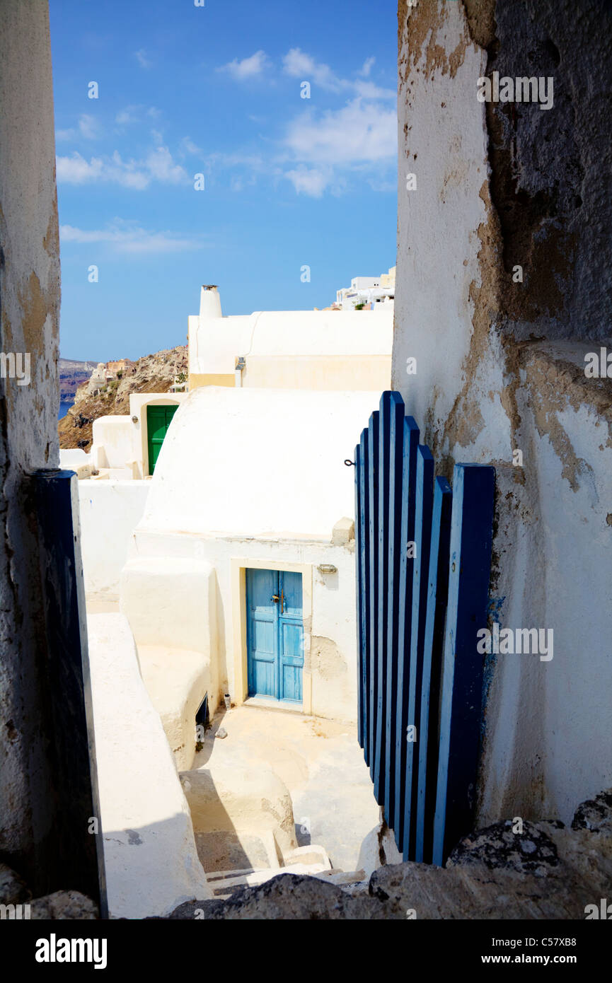 Oia, Santorini, Greek Island, Greece, open blue gate leading down steps ...