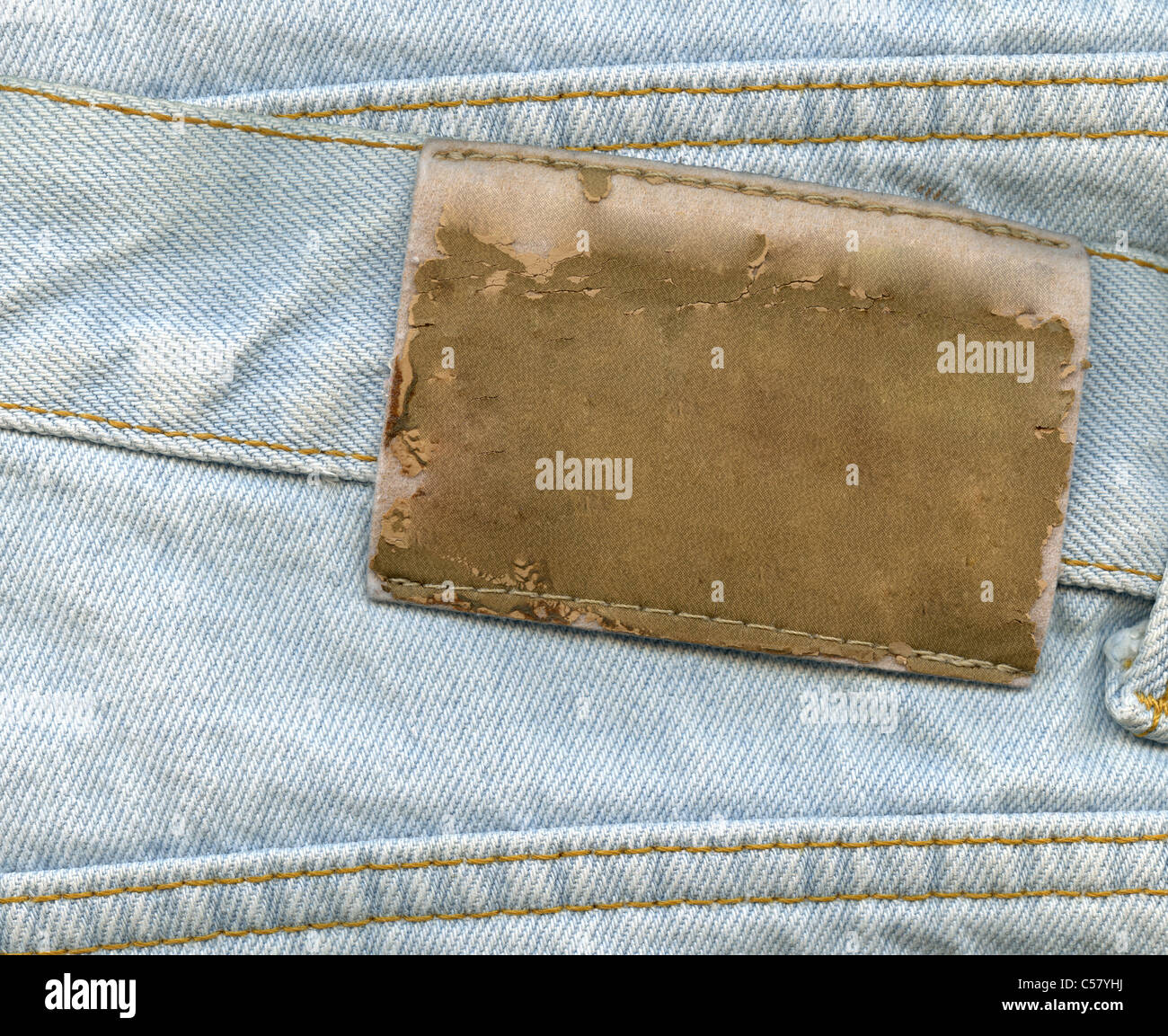 Blank leather label on blue jeans Stock Photo - Alamy