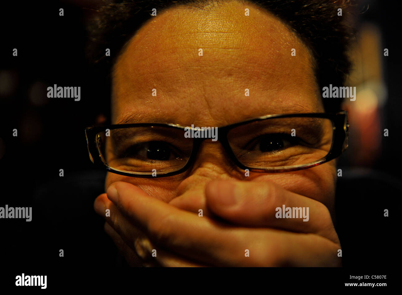 Girl Laughing Covering face Stock Photo - Alamy