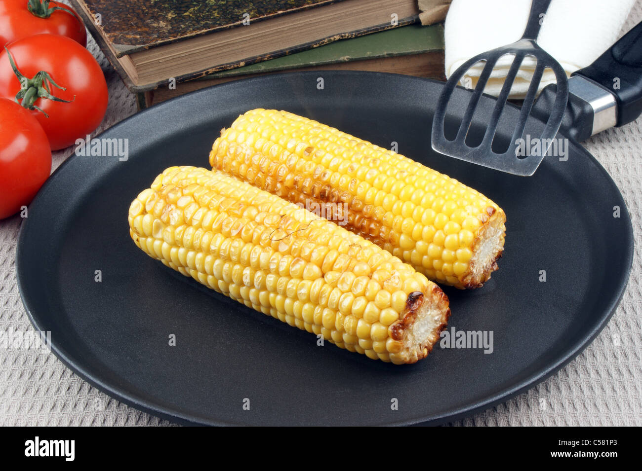 grilled corn on the cob in a pan Stock Photo - Alamy