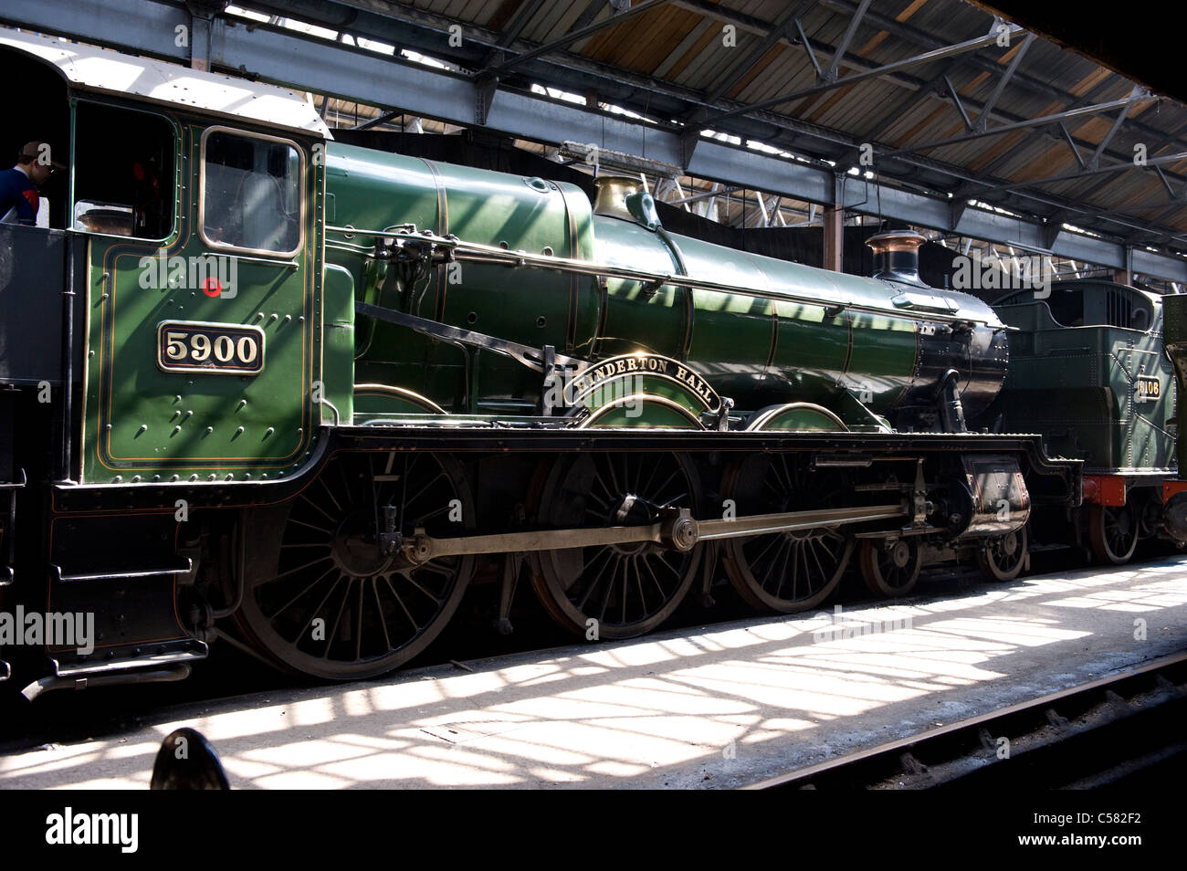 Steam locomotive 'Hinderton Hall' in the engine shed at Didcot Railway ...