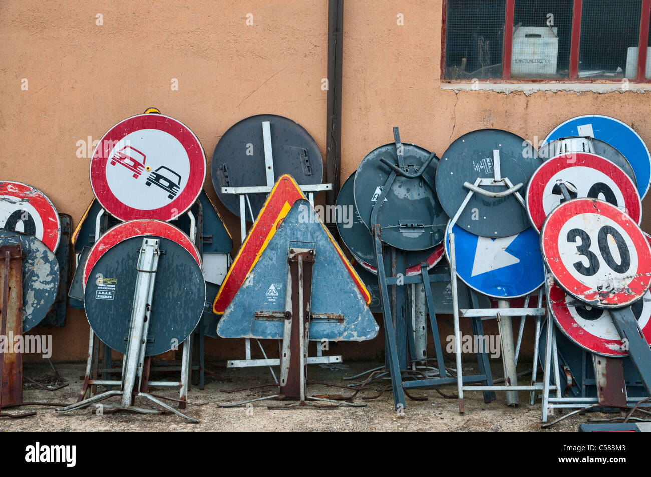 Road signs on the sideway in italy Stock Photo - Alamy
