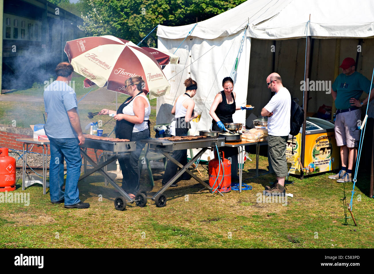 Outside barbecue at an open air event in England Stock Photo - Alamy
