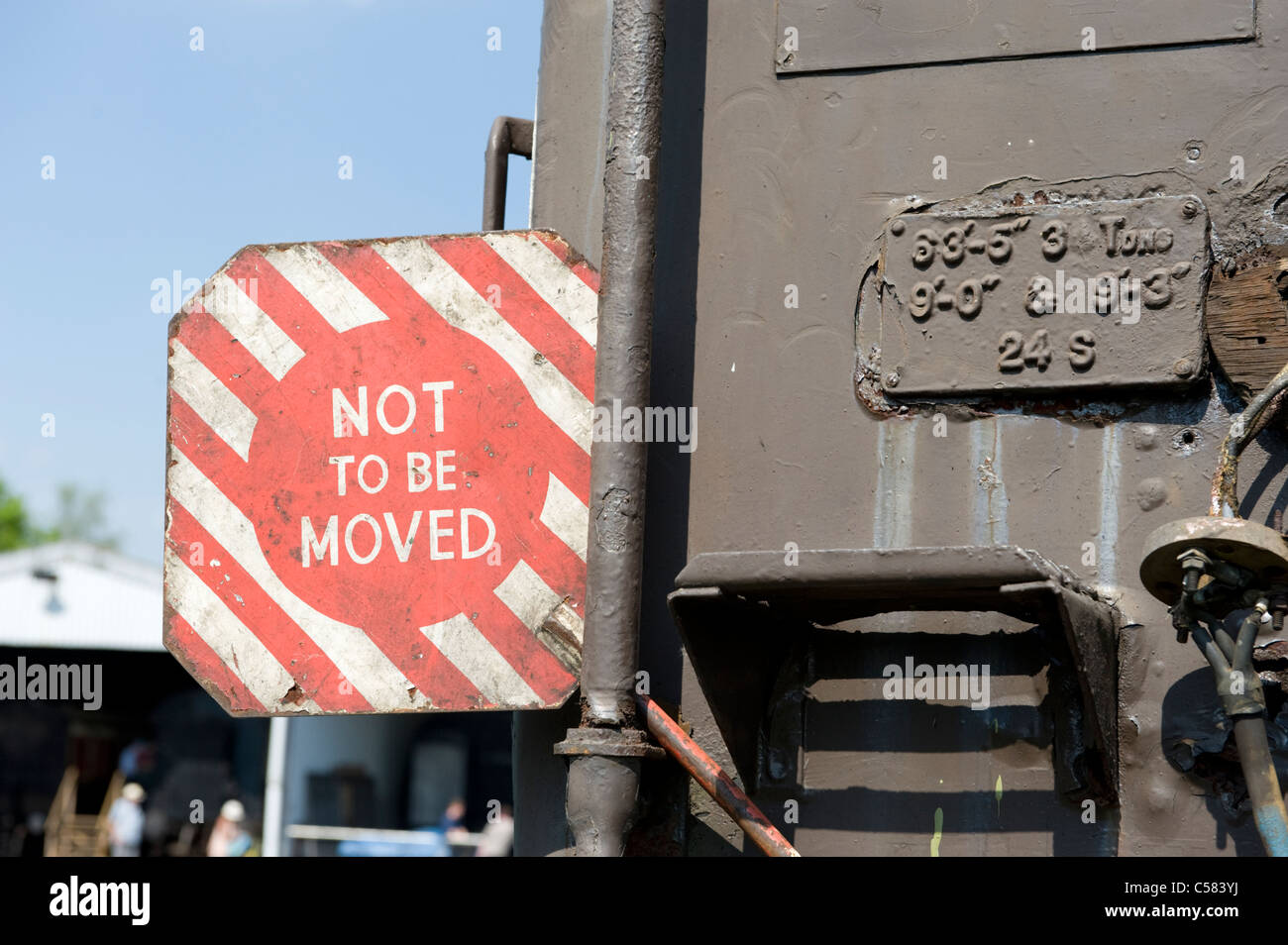 Railway 'Not to Be Moved' sign on a carriage end Stock Photo - Alamy