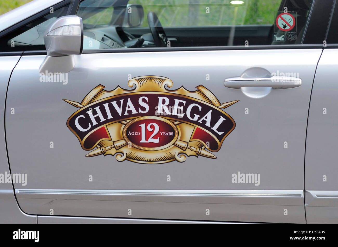 Chivas Regal Logo On A Sales Representatives Car Door Stock Photo - Alamy