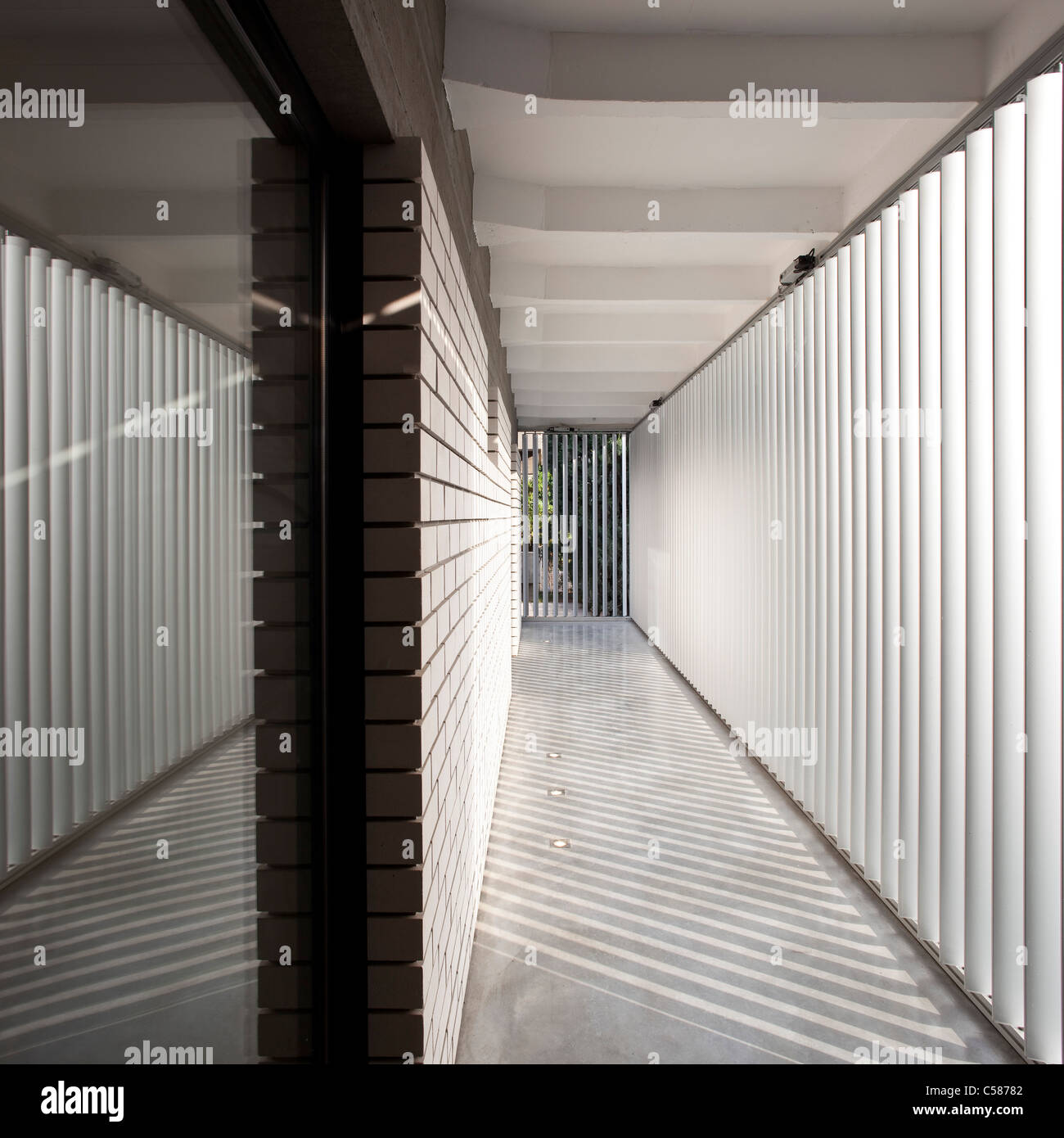 Louvred walkway in a contemporary house Stock Photo - Alamy