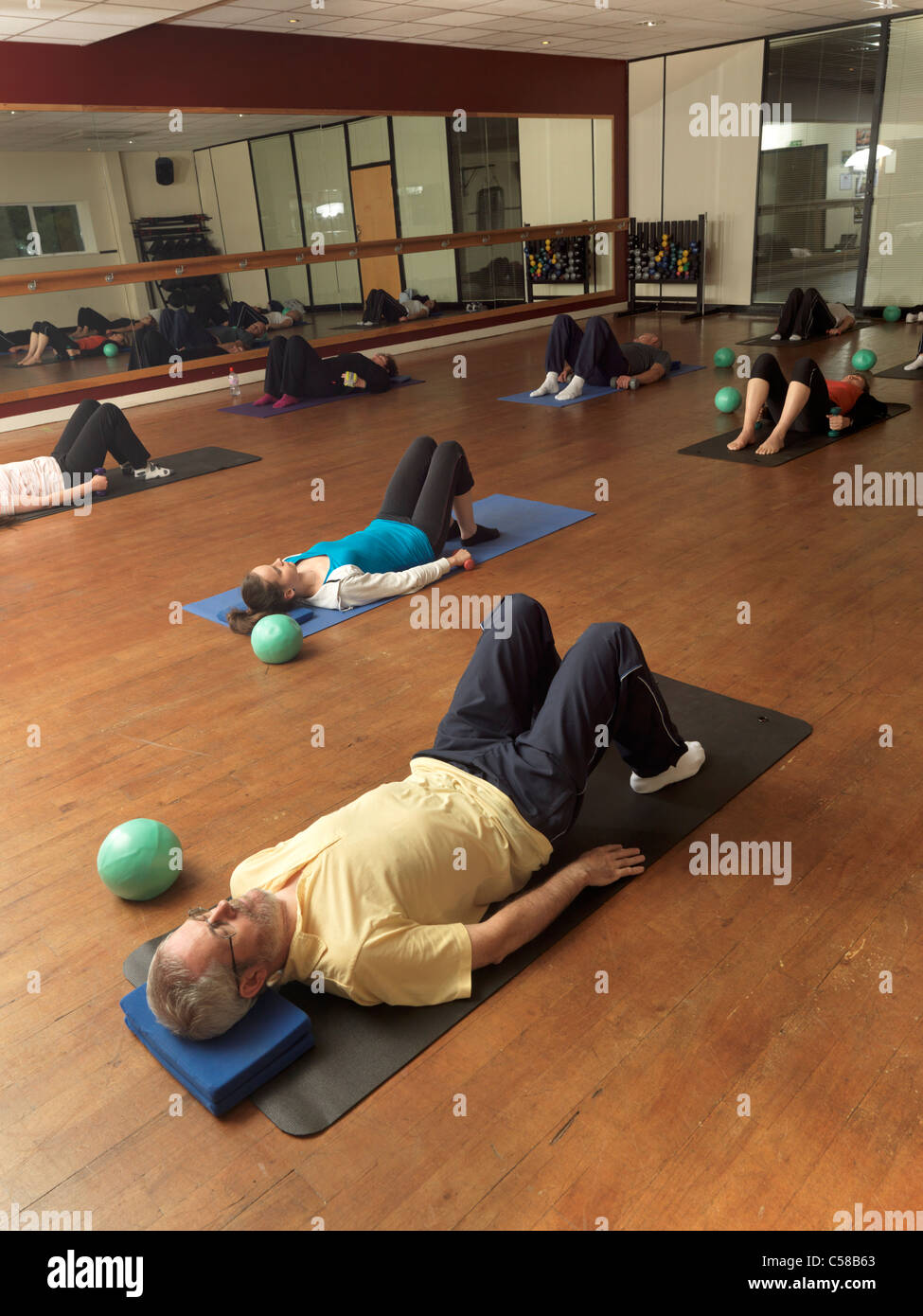 Pilates Physical Fitness Class Stock Photo - Alamy