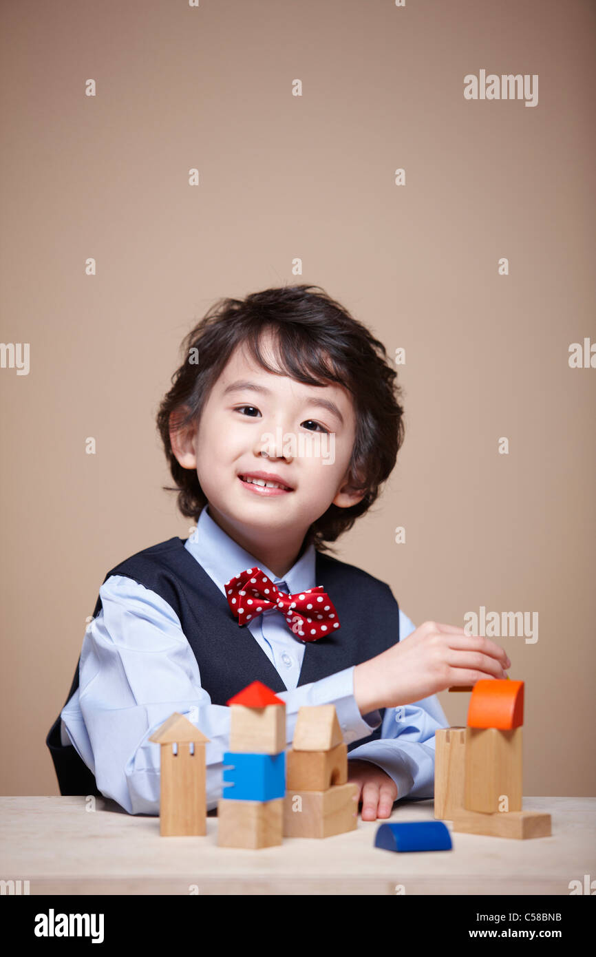 Asian child boy playing block hi-res stock photography and images - Alamy