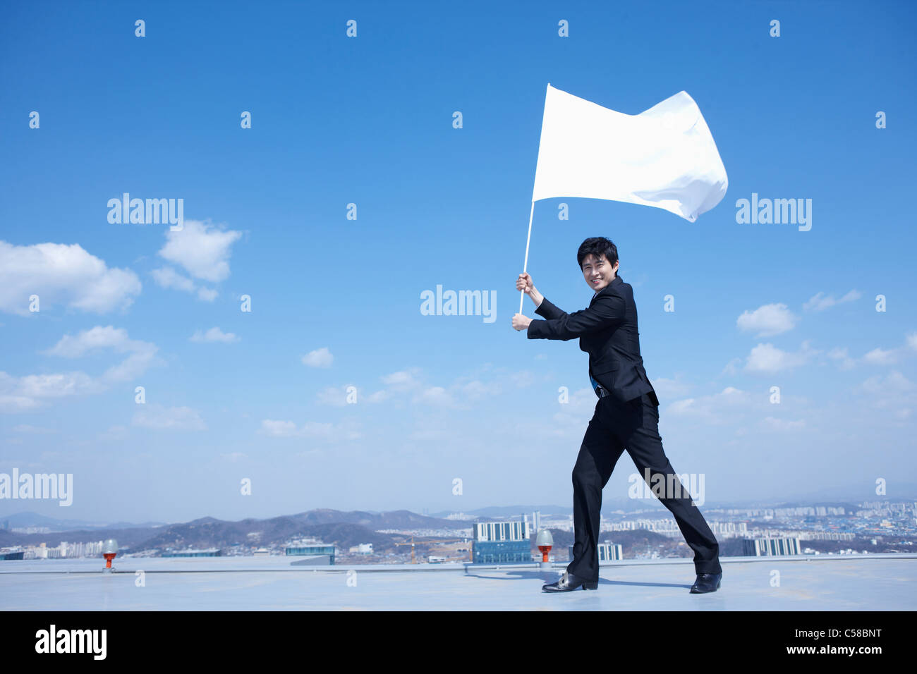 businessman waves flag Stock Photo - Alamy
