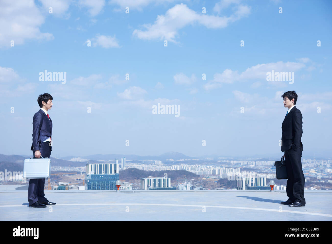 Two rivals facing hi-res stock photography and images - Alamy