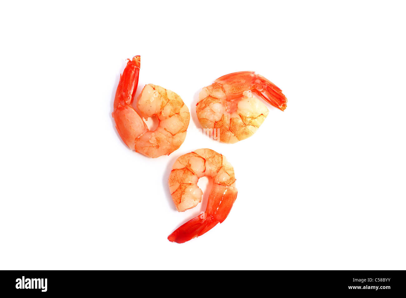 three boiled shrimps isolated on white background Stock Photo - Alamy
