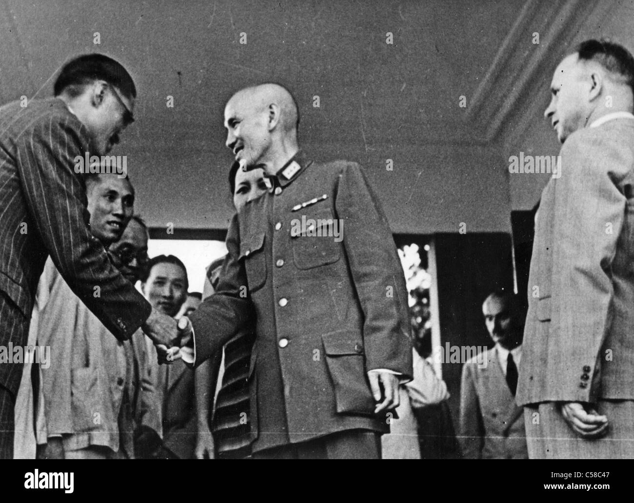 Chiang Kai Shek With His Wife Behind Him At The Chinese Foreign Office In Chungking About 1942