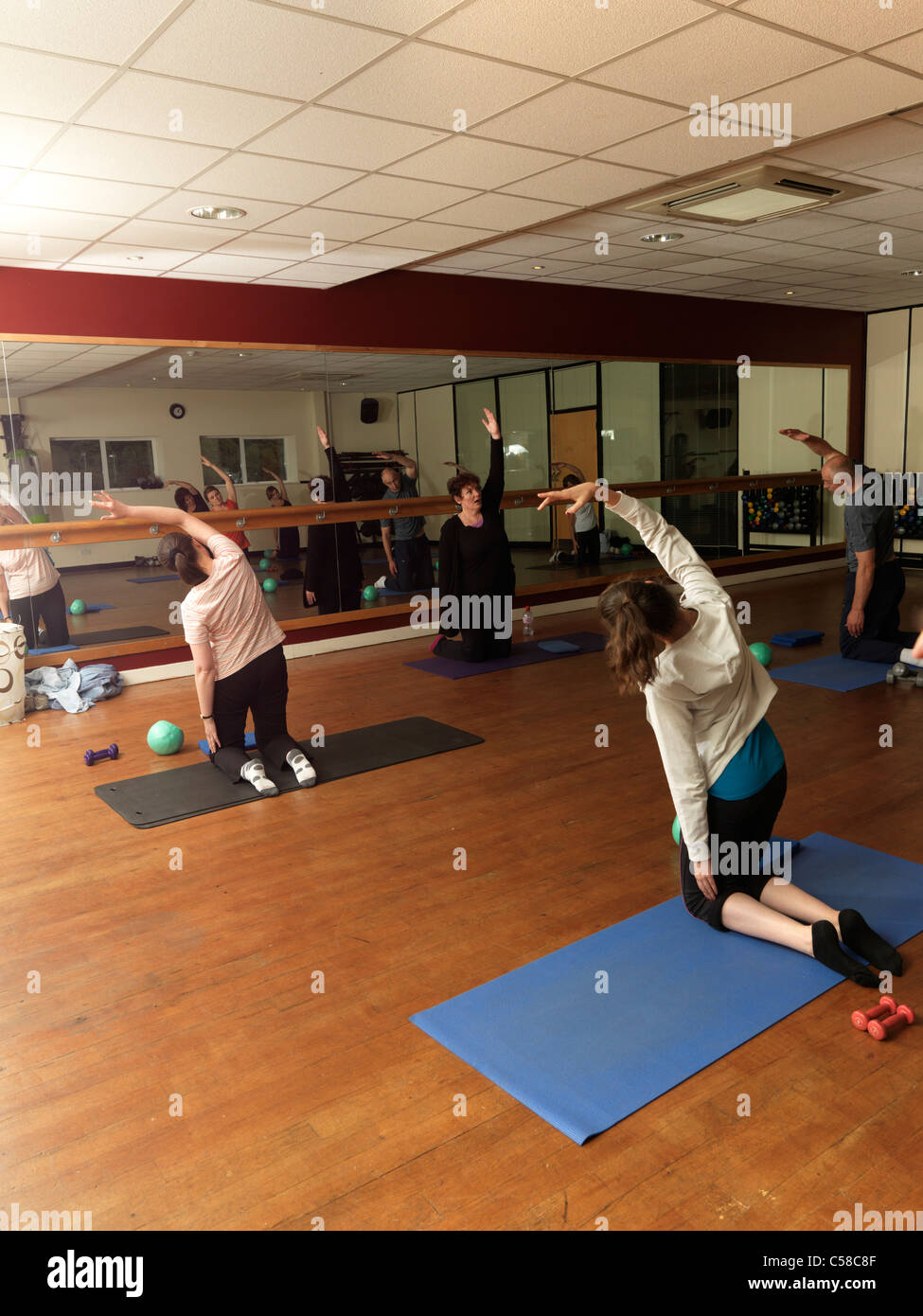 Pilates Physical Fitness Class Stock Photo - Alamy