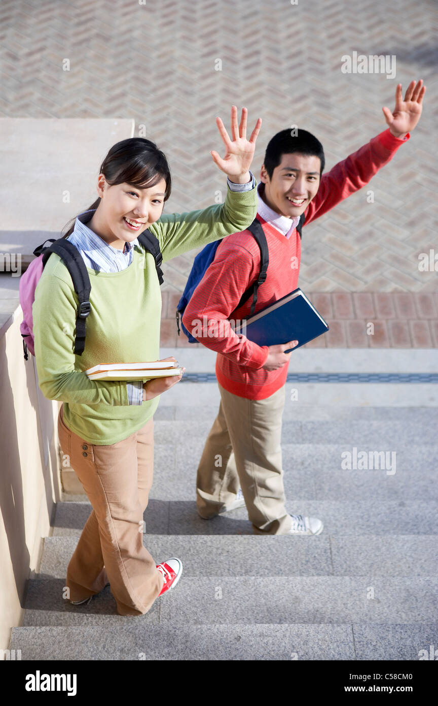 Portrait of teens standing on steps Stock Photo - Alamy