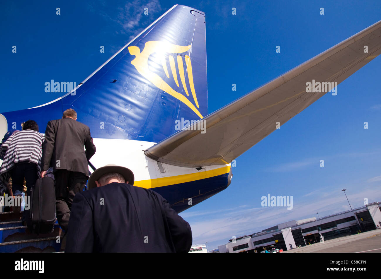 Passengers boarding a Ryanair Boeing 737-800 aircraft at Dublin Airport ...
