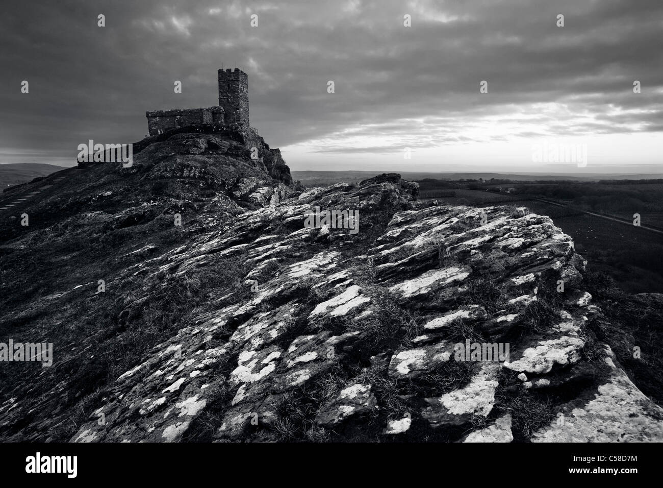 Sunset at Brentor Church, black and white Dartmoor, Devon, England ...
