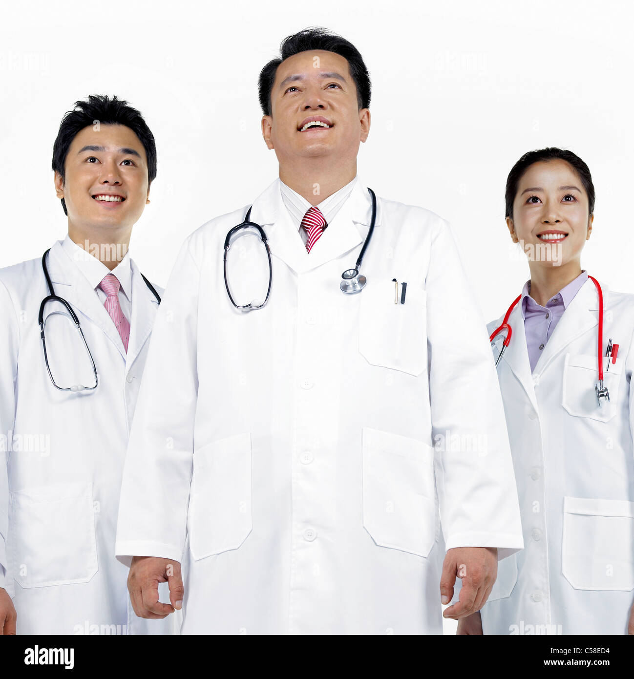 Front view of Doctors, smiling Stock Photo - Alamy