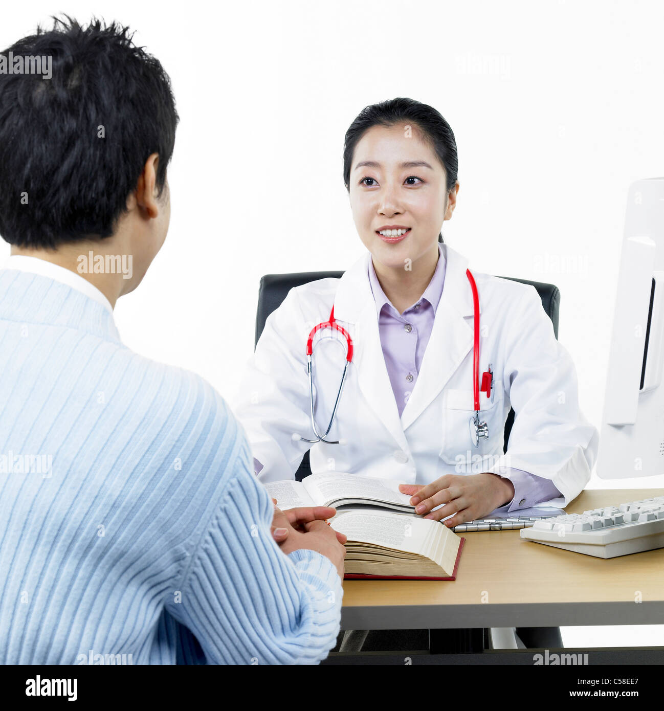 Doctor Talking to Patient about Medication Stock Photo - Alamy