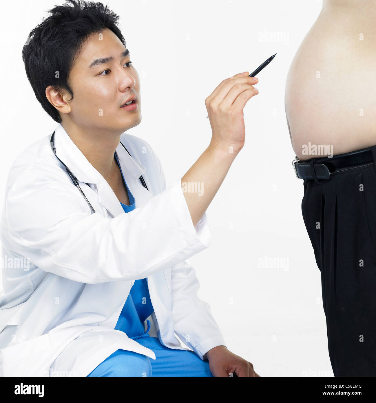 Close-up of Surgeon Inspecting Patient's belly Stock Photo - Alamy