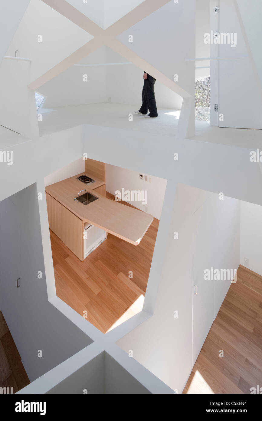 villa-kanousan, villa, View of the kitchen through the central void ...