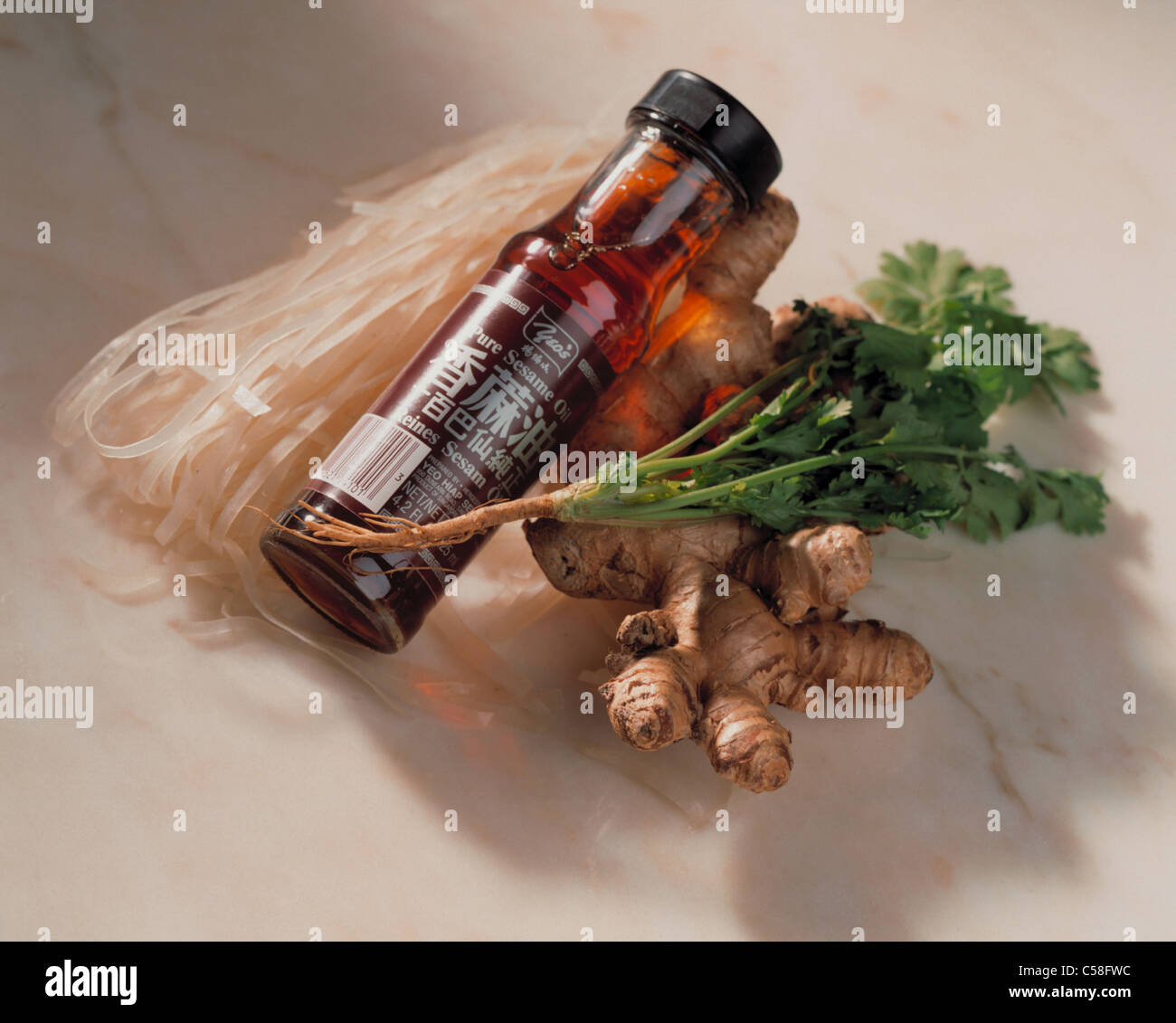 Still: Rice - noodles, sesame oil, coriander, ginger Stock Photo - Alamy