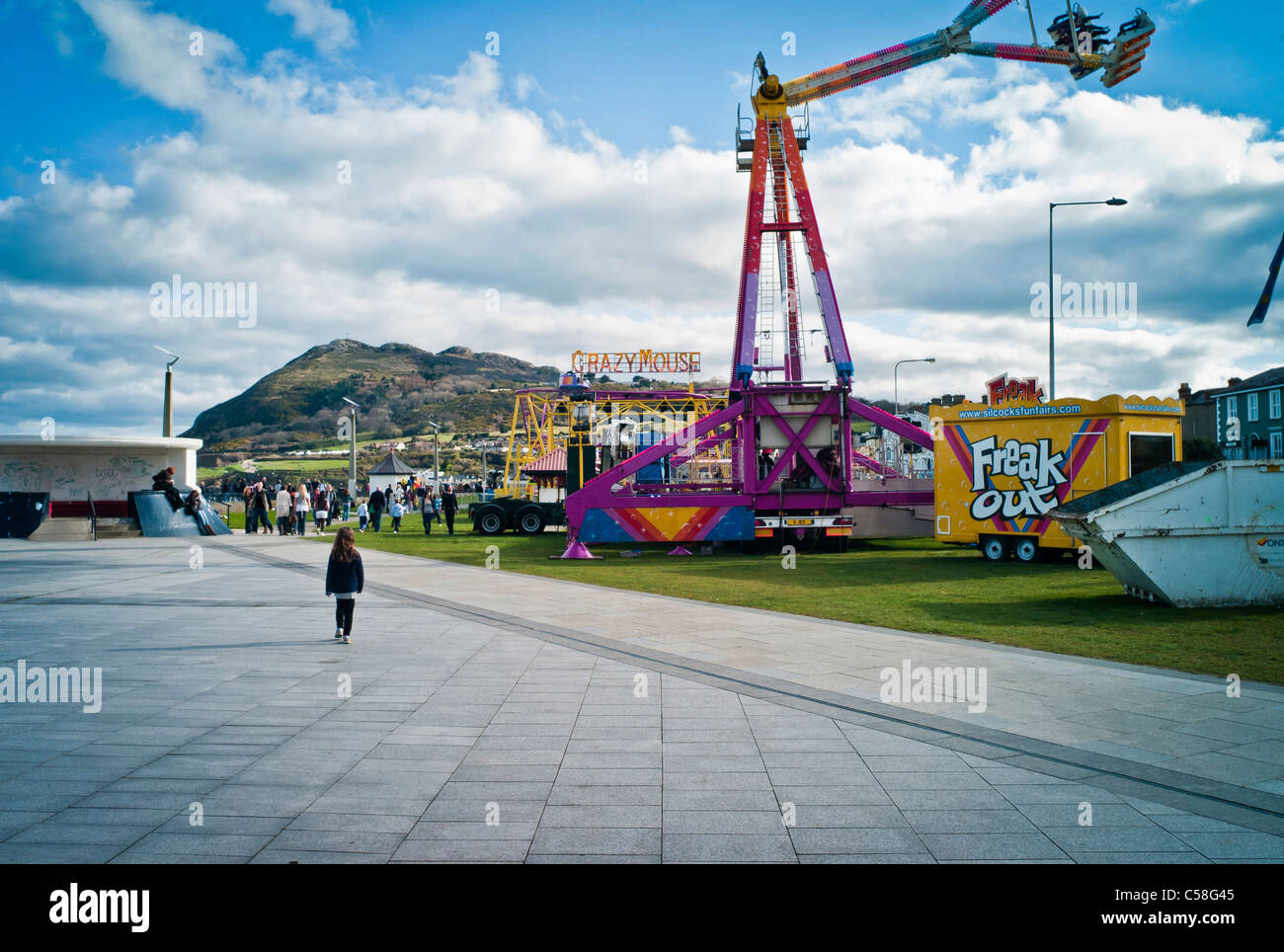 A child walks through an amusement park in Bray Co. Wicklow Stock Photo ...