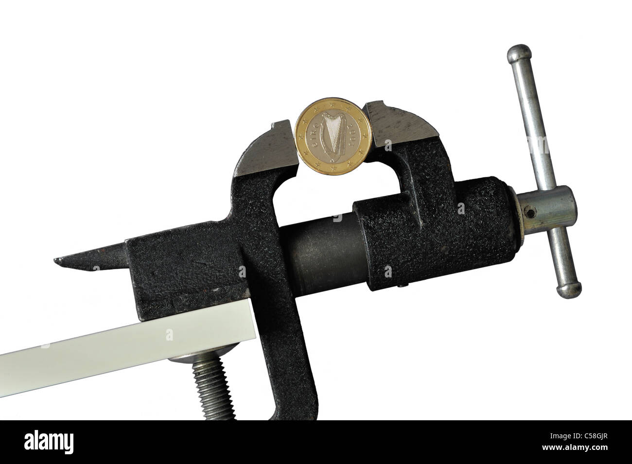 Irish Euro Coin in a Vice Stock Photo - Alamy