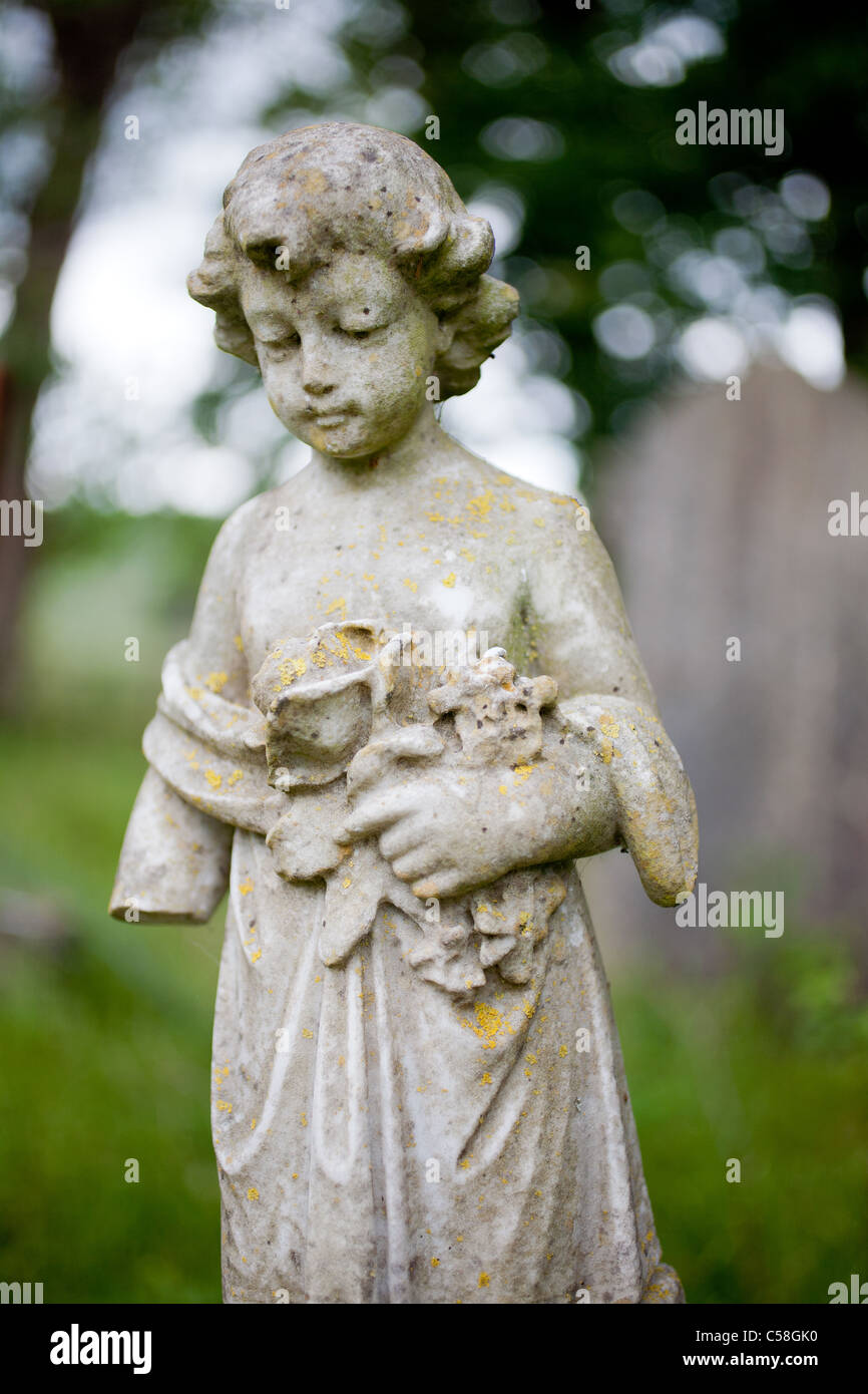 Gravestone cherub. St Marys Church, Salehurst, East Sussex, England, UK ...