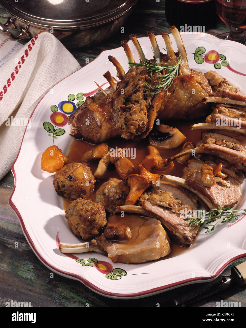 Lamb carré with mushroom - herb filling Stock Photo - Alamy