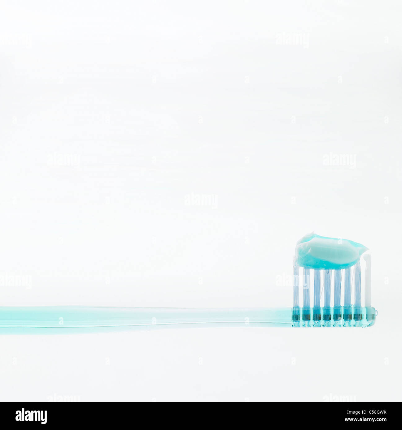 Close-up of toothpaste on toothbrush Stock Photo - Alamy
